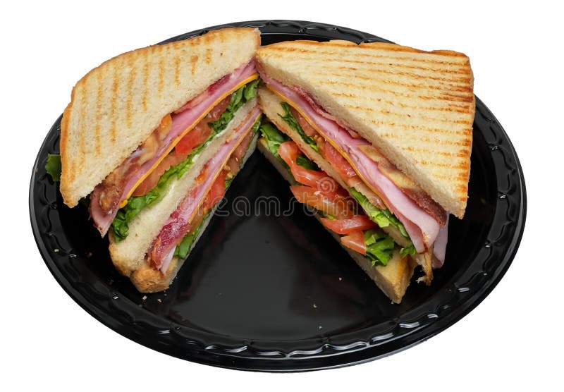 Grilled Club Sandwich Sliced Diagonally To Show Turkey, Bacon, Lettuce ...