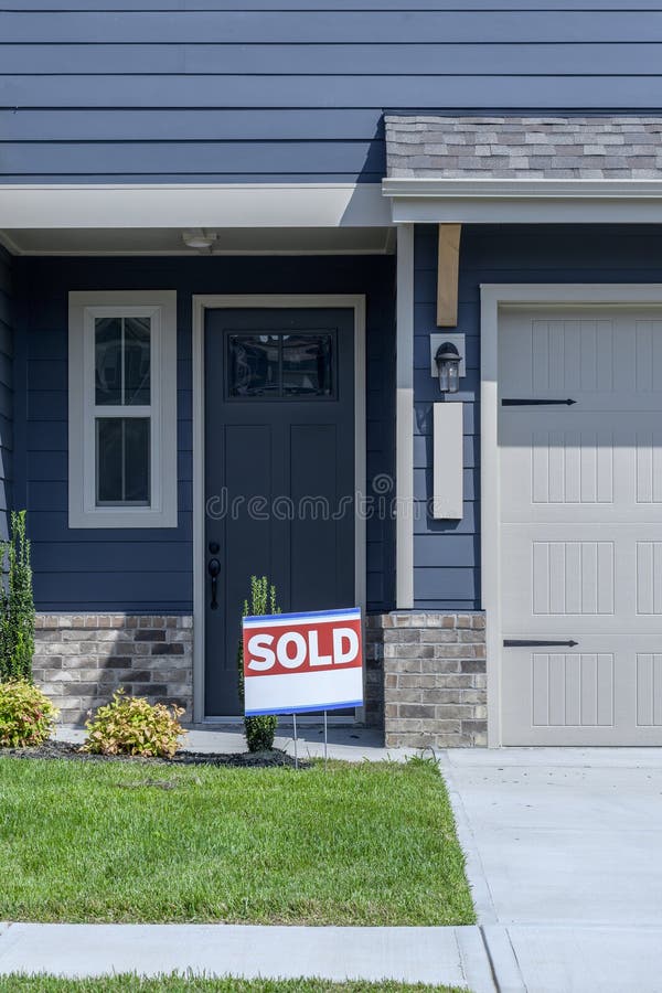 New Construction Condo with Sold Sign Vertical Stock Image - Image of ...