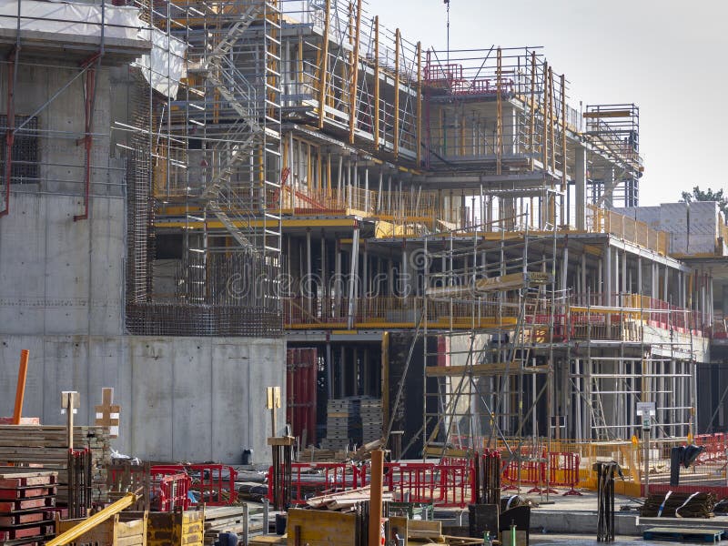 New Construction Site. Building Under Construction with Many ...