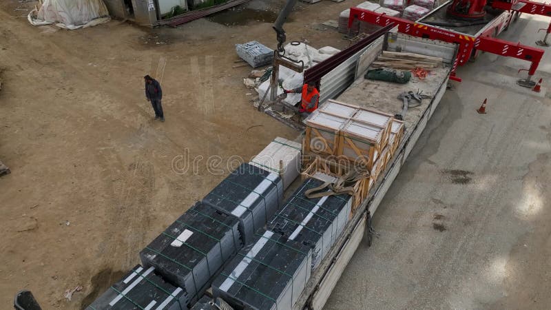 Construction of Apartment Buildings, the Process of Unloading Cargo on ...