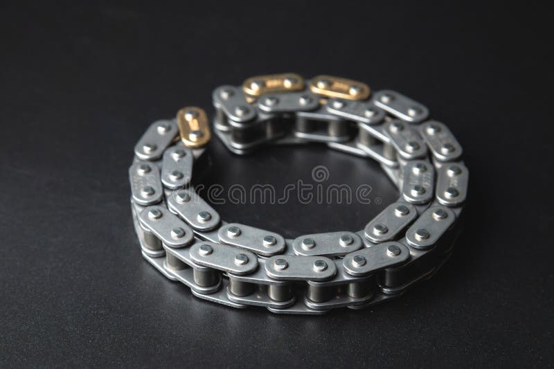 New Cylinder Head Timing Chain on Black Moth. Engine Parts Stock Image ...
