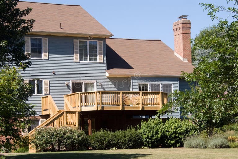 New deck on suburban home stock photo. Image of house - 20489754