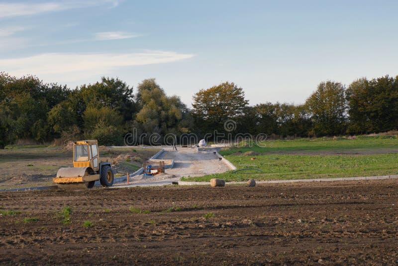 New Development Area, Road Under Construction, Construction Vehicle ...