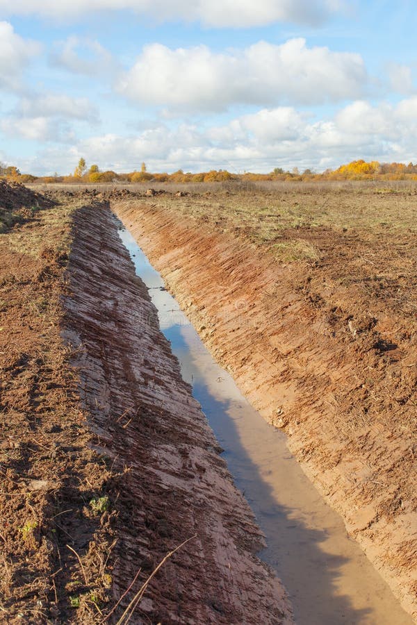 New ditch. stock image. Image of grey, water, blue, farmland - 34357361