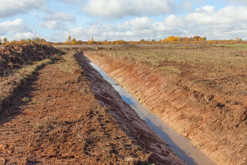 New ditch. stock image. Image of spring, lowland, grey - 34357363