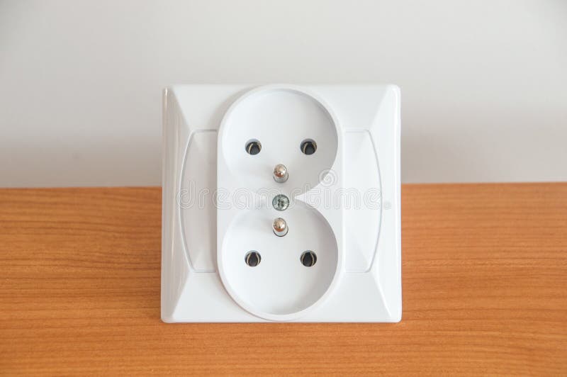 New Double Electric Socket Type E on Wooden Table Stock Photo - Image ...
