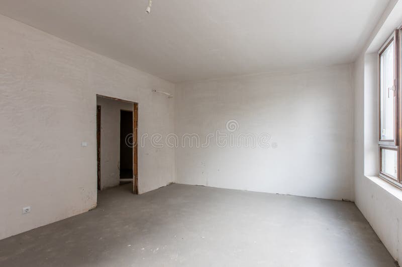 New Empty Room Under Construction. Plaster Walls. New Home. Concrete ...