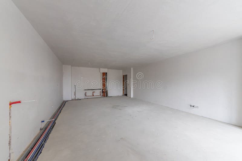 New Empty Room Under Construction. Plaster Walls. New Home. Concrete ...