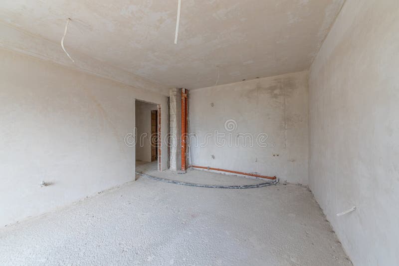 New Empty Room Under Construction. Plaster Walls. New Home. Concrete ...