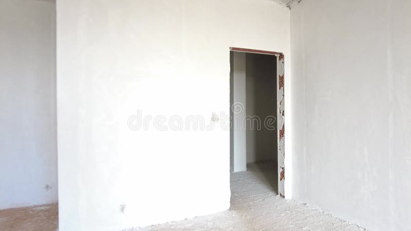 New Empty Room Under Construction. Plaster Walls. New Home. Concrete ...