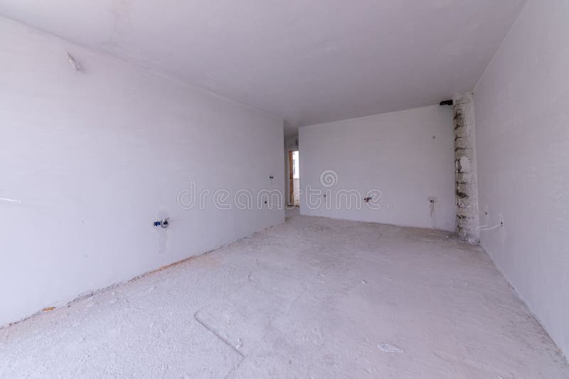 New Empty Room Under Construction. Plaster Walls. New Home. Concrete ...