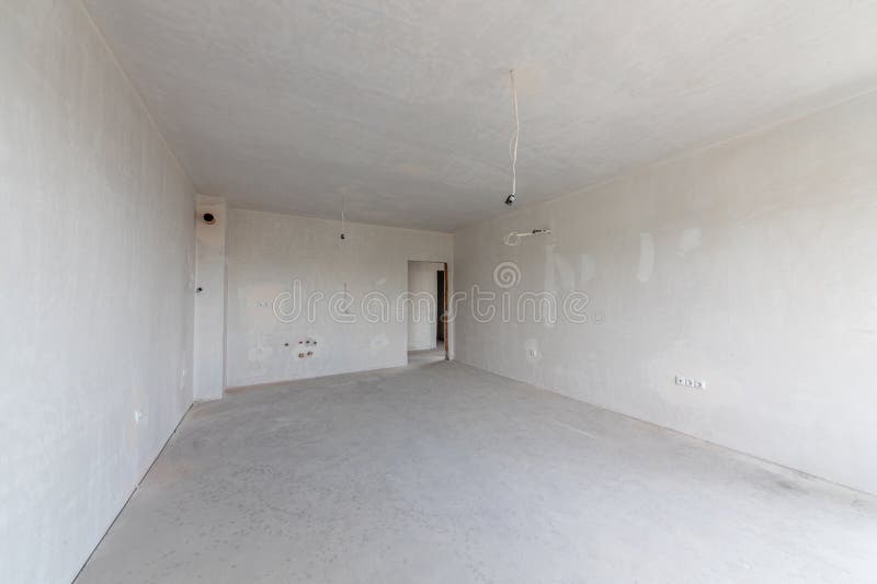 New Empty Room Under Construction. Plaster Walls. New Home. Concrete ...