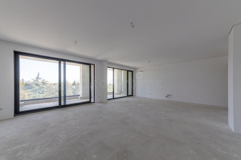 New Empty Room Under Construction. Plaster Walls. New Home. Concrete ...