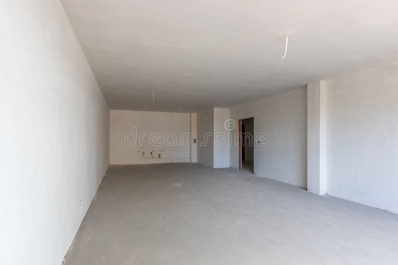 New Empty Room Under Construction. Plaster Walls. New Home. Concrete ...