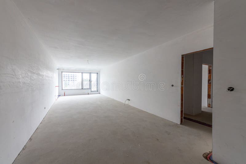 New Empty Room Under Construction. Plaster Walls. New Home. Concrete ...