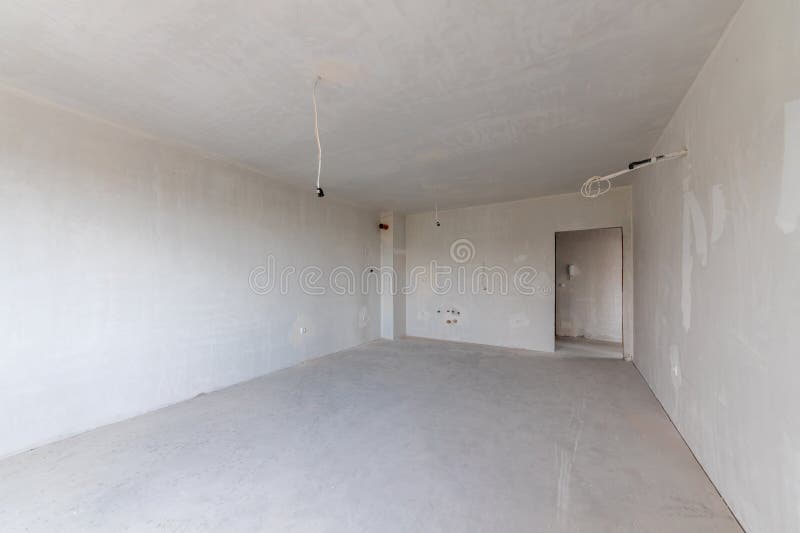 New Empty Rooms Under Construction. Plaster Walls. New Home. Concrete ...