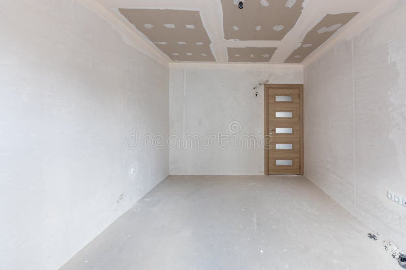 New Empty Rooms Under Construction. Plaster Walls. New Home. Concrete ...