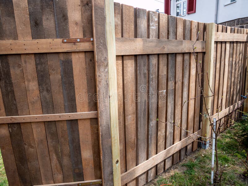 New Fence is Being Built in the Garden Stock Image - Image of gardening ...