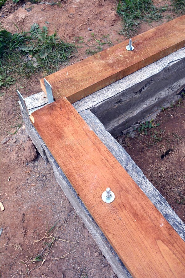 New Foundation Construction with Wood Plank and Anchor Stock Photo ...