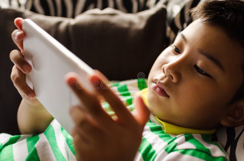 New Generation Kid Using New Technology To Play Stock Image - Image of ...