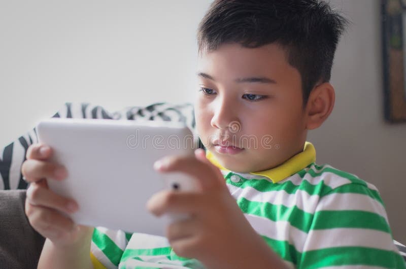 New Generation Kid Using New Technology To Play Stock Image - Image of ...