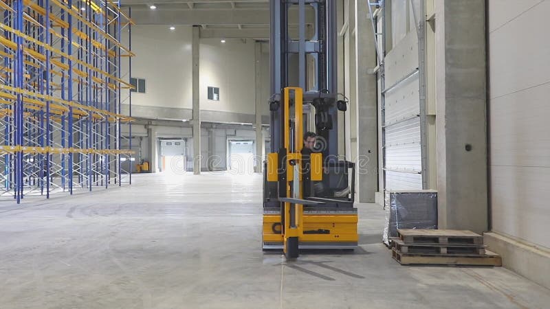 Forklift High Rack Stacker stock video. Video of warehouse - 192566017