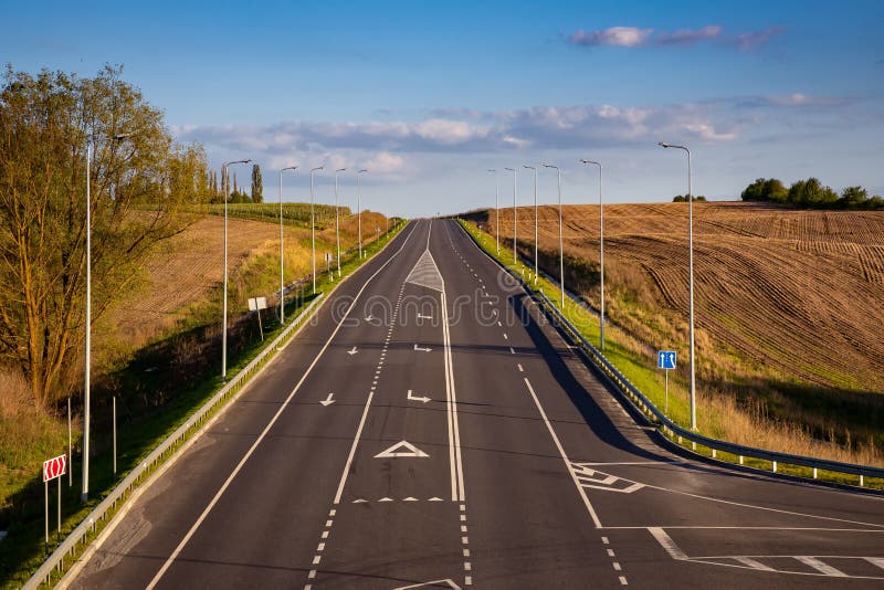 New High-speed Asphalt Road To the District City Stock Photo - Image of ...