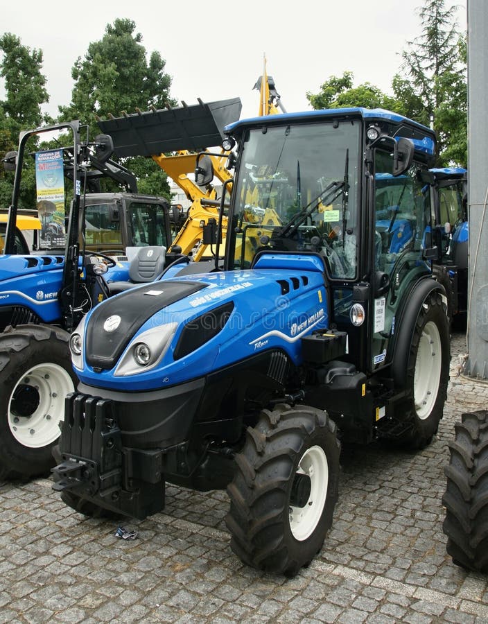 New Holland T5.75 Tractor Parked on Cobblestone Surface Editorial Stock ...