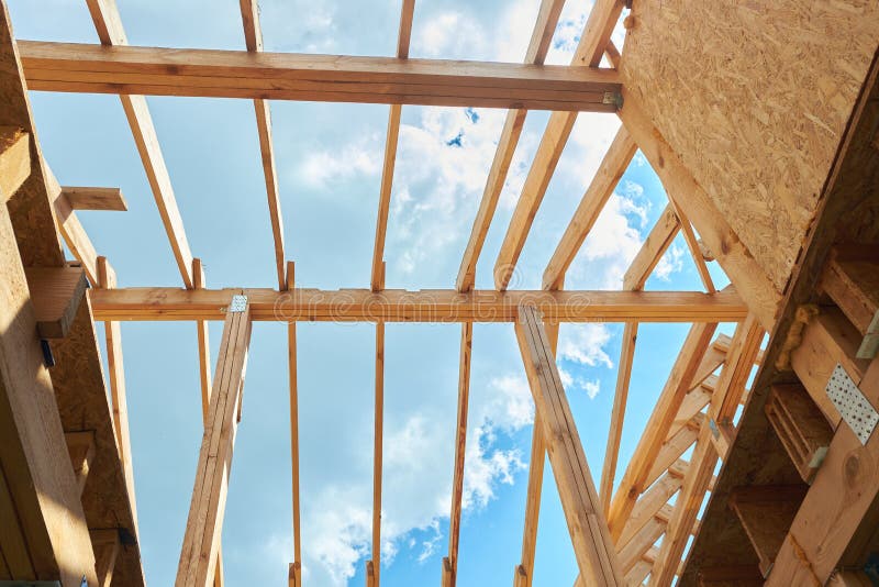 New Home Construction. Build with Wooden Truss, Post and Beam Framework ...