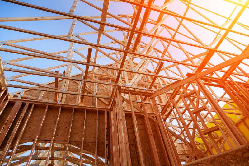 New Home Construction. Build with Wooden Truss, Post and Beam Framework ...