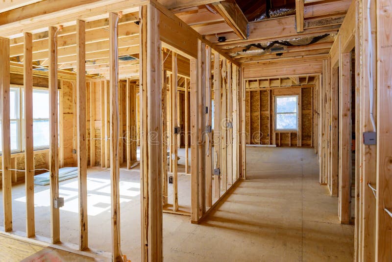 New Home Construction Framing of a House Under Construction Stock Image ...