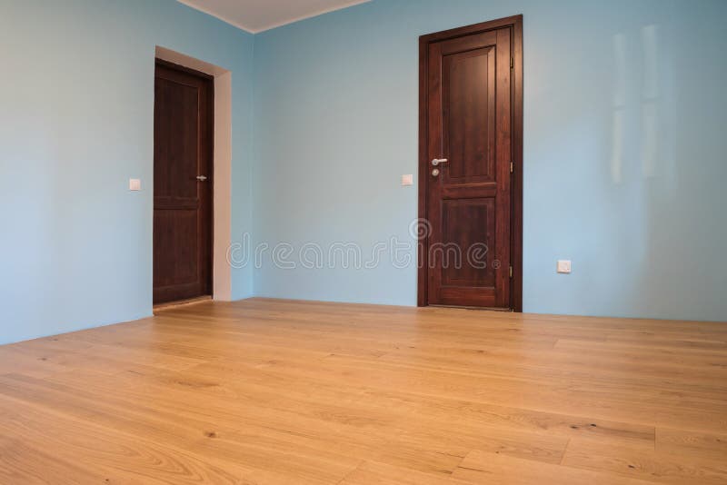 New Home Construction Interior Room with Wooden Floors and Wooden Doors ...
