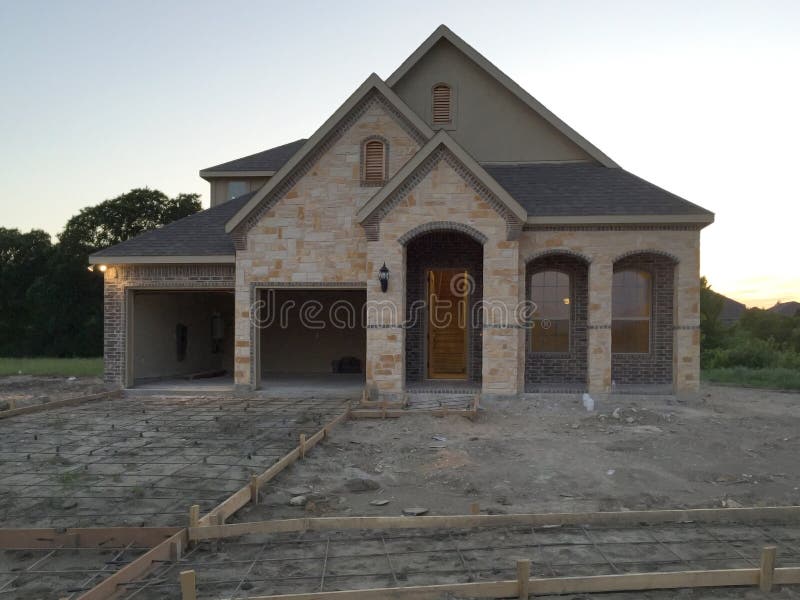 New Home Construction at Sunset Stock Photo - Image of site ...