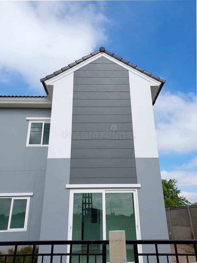 New Home Exterior Design Using Gray and White Color Create Interest ...
