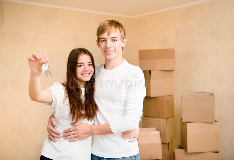 New home owners with key stock image. Image of kitchen - 30647133