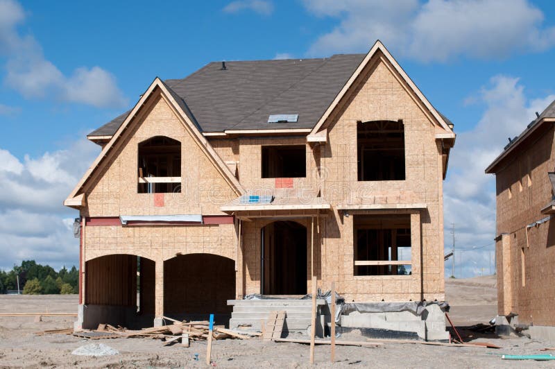 New Home Under Construction Stock Image - Image of shingles, photograph ...
