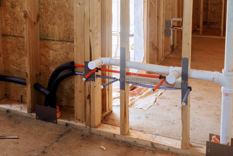 Water System Integration in New Home Construction with Red and Blue Pvc ...