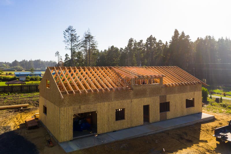 New Home Under Construction in Rural Area with Pine Trees Around it ...