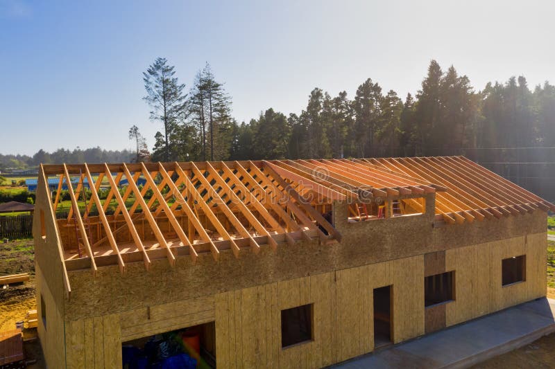 New Home Under Construction in Rural Area with Pine Trees Around it ...