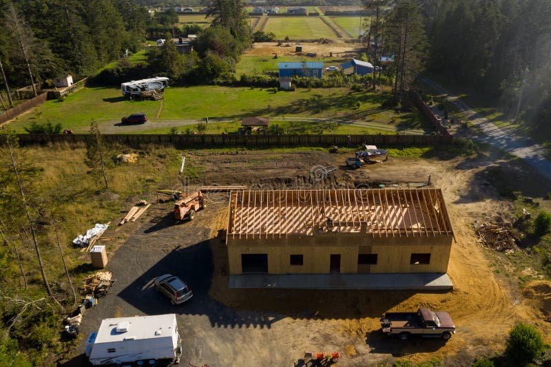 New Home Under Construction in Rural Area Surrounded by Trucks and ...