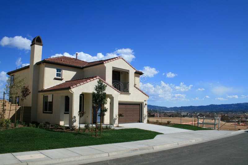 New Home with Vacant Lot stock image. Image of property - 4613749