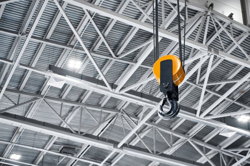 New Hook Assembly with Yellow Roller of Moving Crane Stock Image ...