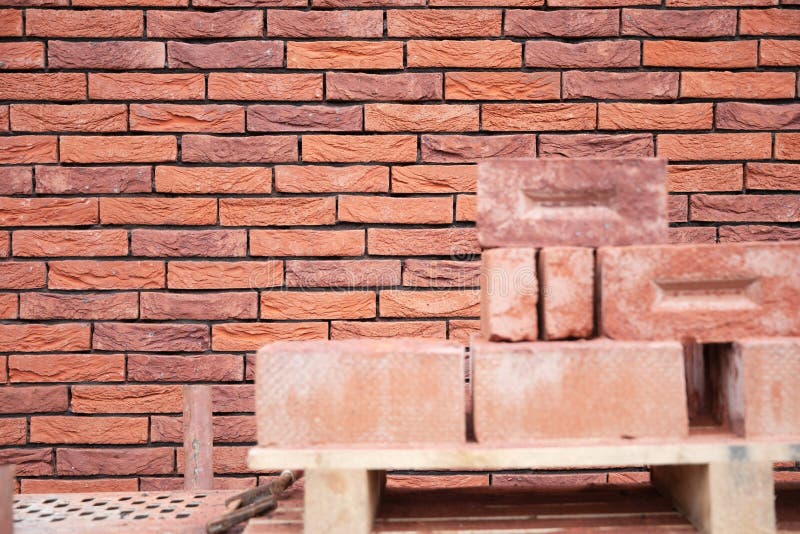 A New House is Being Built, the Beginning of Brickwork with Red Bricks ...