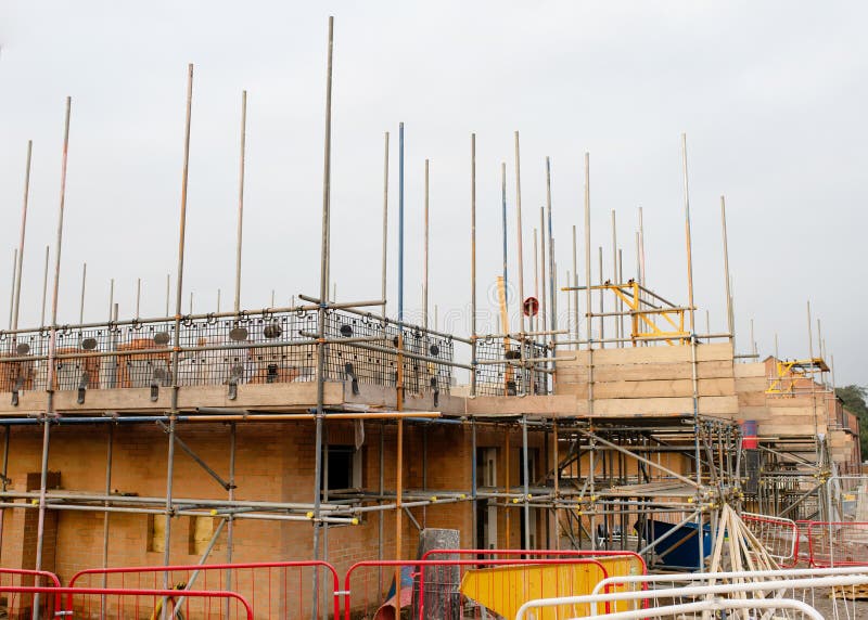 New House with Brick Wall is Being Erected and Scaffold System Placed ...