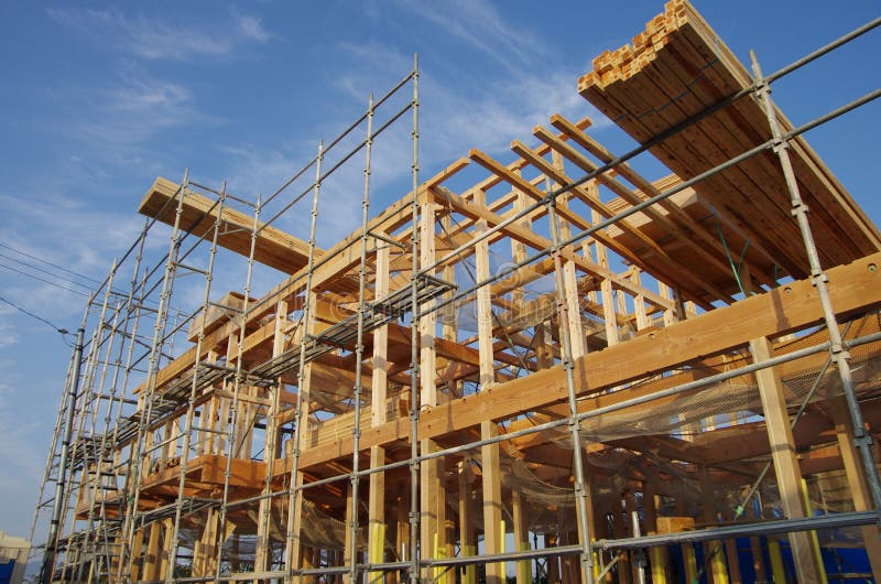 New House Under Construction Stock Photo - Image of lumber, wood: 35560266