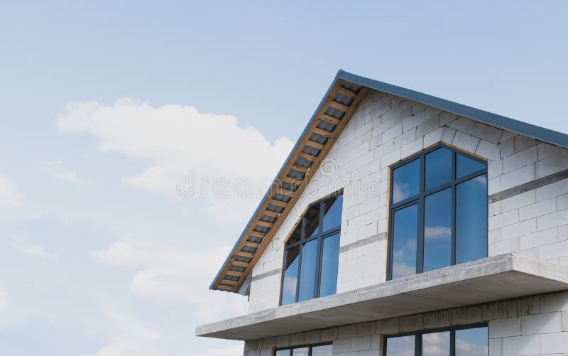 A New House Under Construction with Large Windows Stock Photo - Image ...