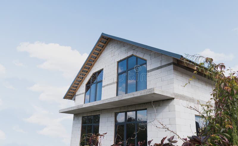 A New House Under Construction with Large Windows Stock Image - Image ...