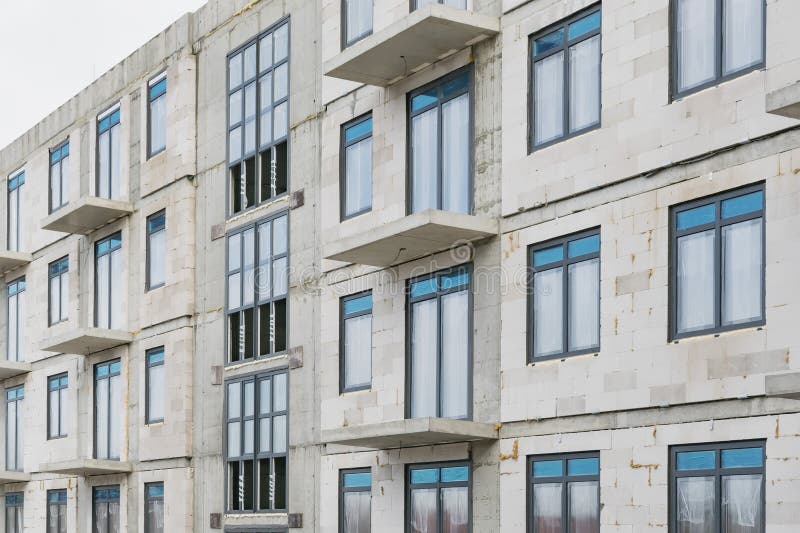 A New House Under Construction with Plastic Windows Stock Illustration ...