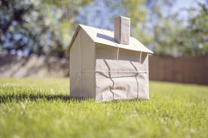 New House Wrapped in Brown Paper Stock Image - Image of construct ...