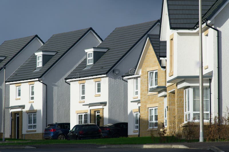 New Housing Development Under Dark Storm Clouds Stock Photo - Image of ...